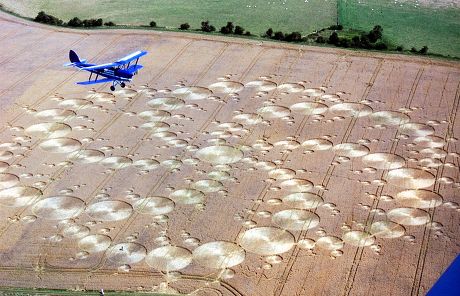 Biplane Aircraft Over Giant Crop Circles Editorial Stock Photo - Stock ...