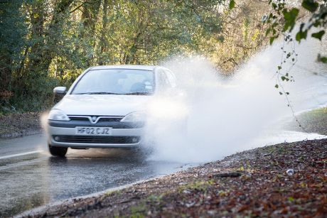 Car Passing Through Standing Water On Editorial Stock Photo - Stock ...