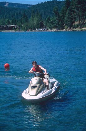 Teenager Riding On Waverunner On Lake Editorial Stock Photo - Stock ...
