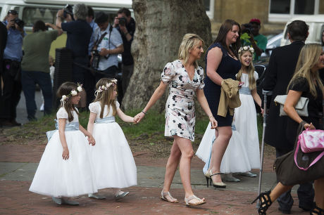 Bridesmaids Guests Entering Church Editorial Stock Photo - Stock Image ...