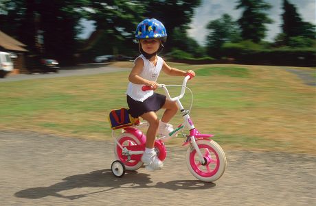 Girl On Bicycle Stabilisers Model Released Editorial Stock Photo ...