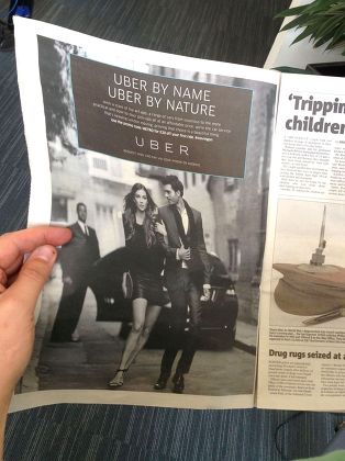 Uber Advert Metro Newspaper Editorial Stock Photo - Stock Image ...