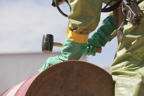 Model Released Hazmat Firefighter Plugging Drum Editorial Stock Photo - Stock Image | Shutterstock