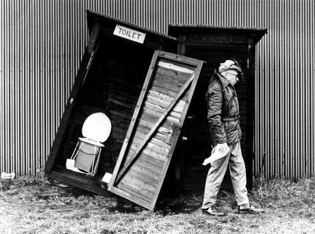 Man Walking Past Outdoor Toilet Editorial Stock Photo - Stock Image ...