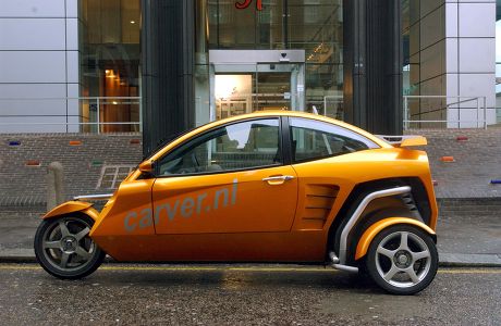 TIM HODGETTS, DRIVING THE NEW 3 WHEELED CARVER CAR, LONDON, BRITAIN -14 ...