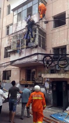 Firefighter Climbs Through Balcony Window Hanging Editorial Stock Photo ...