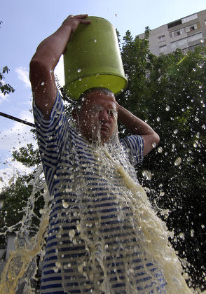 80 Bucket over head Stock Pictures, Editorial Images and Stock Photos ...