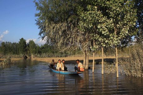 Kashmiri Flood Victims Ride Boat Through Editorial Stock Photo - Stock ...