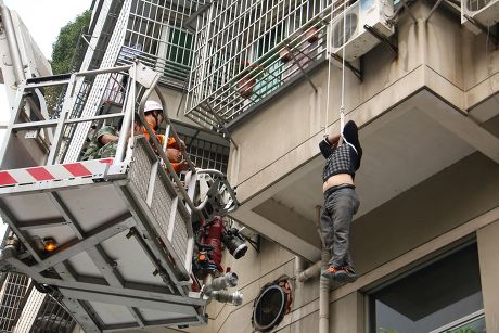 16 Dangling worker Stock Pictures, Editorial Images and Stock Photos ...