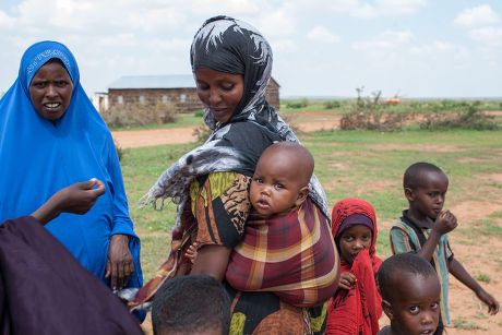 Somali Woman Carries Her Baby While Editorial Stock Photo - Stock Image ...