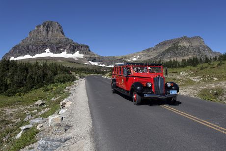 Red Bus Tour On Goingtothesun Road Editorial Stock Photo - Stock Image ...