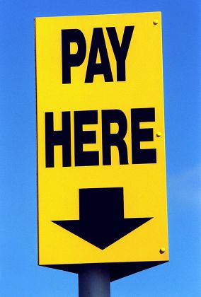 Pay Here Sign Editorial Stock Photo - Stock Image | Shutterstock
