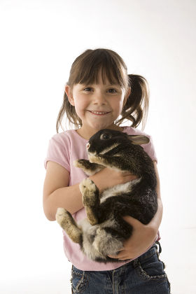 250 Children holding pets Stock Pictures, Editorial Images and Stock ...