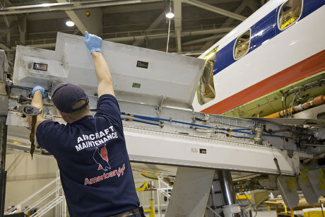 Worker Does Heavy Maintenance On Embraer Editorial Stock Photo - Stock ...