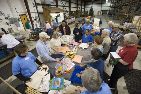 Staff Member Teaches Volunteers How Pack Editorial Stock Photo - Stock ...