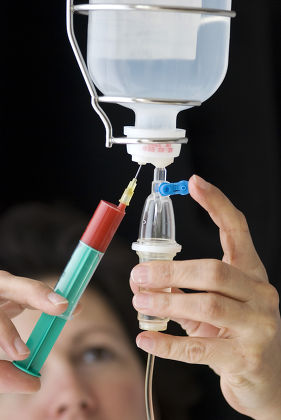 Model Released Doctor Preparing Infusion By Editorial Stock Photo ...