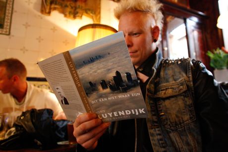 Man Reading Book By Dutch Author Editorial Stock Photo - Stock Image ...
