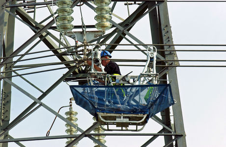 Worker Replacing Working On National Grid Editorial Stock Photo - Stock ...