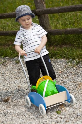 1 Boy push toy carts Stock Pictures, Editorial Images and Stock Photos ...