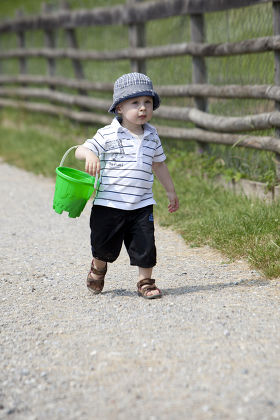 41 Carrying pails Stock Pictures, Editorial Images and Stock Photos ...