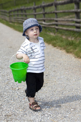 Model Released Little Boy Carrying Sand Editorial Stock Photo - Stock ...