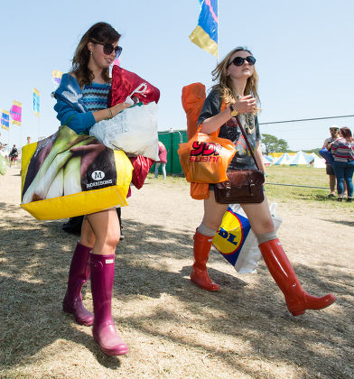 Festival Goers Wearing Brightly Coloured Wellies Editorial Stock Photo ...