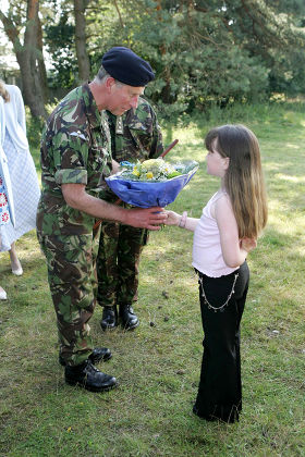 1 British army beret uniform bouquet flowers girl child Stock Pictures ...