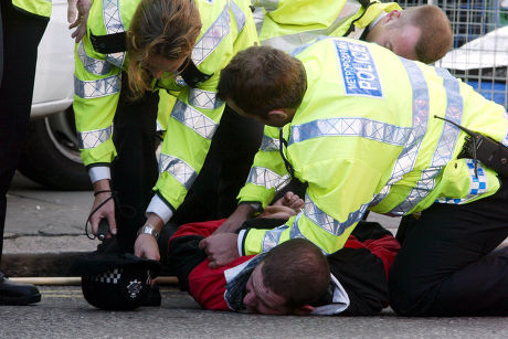 Police Restraining Protester Editorial Stock Photo - Stock Image ...