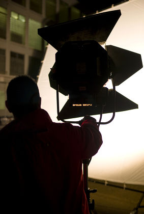 Lighting Technician Setting Floodlight On Film Editorial Stock Photo ...