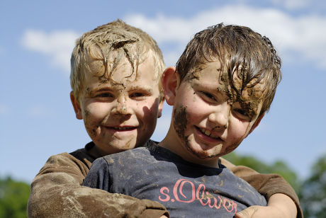 Model Released Two Friends Covered Mud Editorial Stock Photo - Stock ...
