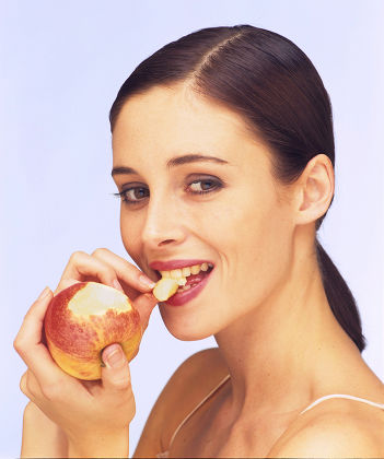 Model Released Young Woman Eating Apple Editorial Stock Photo - Stock ...
