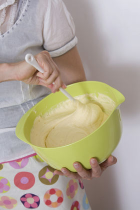 2 Woman stirs mixture Stock Pictures, Editorial Images and Stock Photos ...