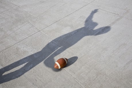 Shadow Throwing American Football Editorial Stock Photo - Stock Image ...