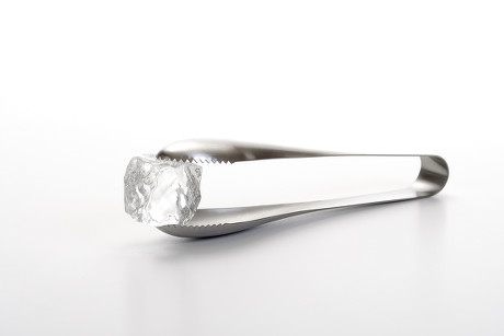 Ice Cube Tongs Holding Ice Cube Editorial Stock Photo - Stock Image ...