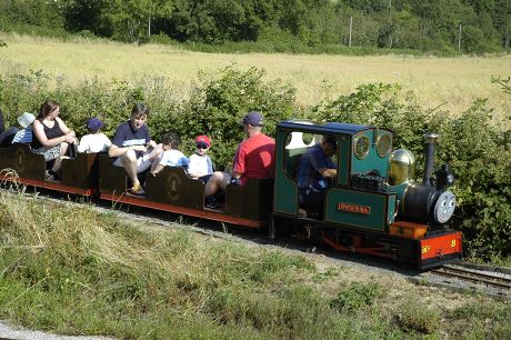 Miniature Train Carrying Passengers Through Countryside Editorial Stock ...