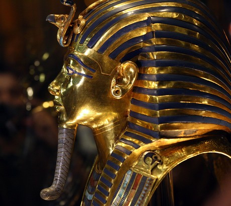 Tutankhamun gold mask back on display after beard restoration at the ...