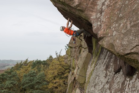 Rock Climber Climbing On Gritstone Peak Editorial Stock Photo - Stock ...