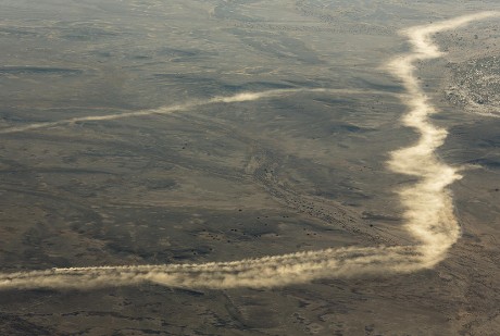 Dust Trails Left By Vehicles Driving Editorial Stock Photo - Stock ...