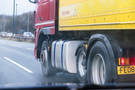 Heavy Goods Vehicle Overtaking Car On Editorial Stock Photo - Stock ...