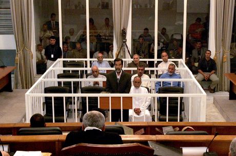 Saddam Hussein Listens Presiding Judge Rizgur Editorial Stock Photo ...