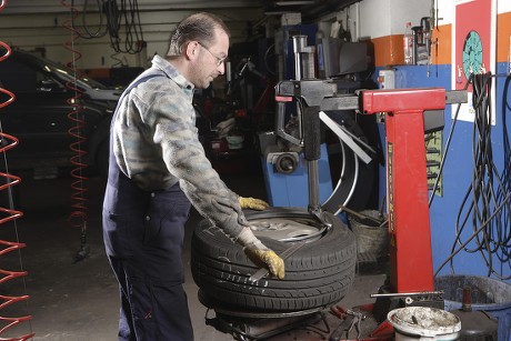 38 Checking tires Stock Pictures, Editorial Images and Stock Photos ...