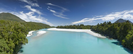 Tuerkiser Arawhata River On Shore Green Editorial Stock Photo - Stock ...