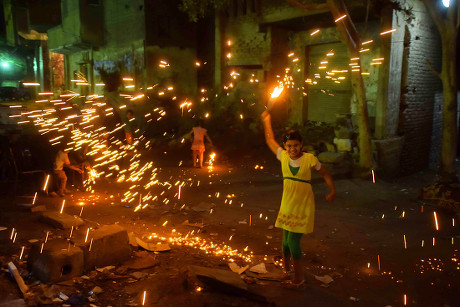 __COUNT__ Children play with firecrackers ahead of Ramadan, Cairo ...