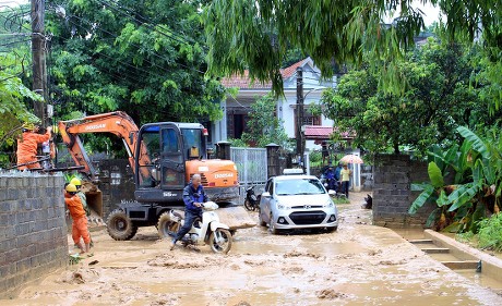 Workers Clean Mud On Road Ha Editorial Stock Photo - Stock Image ...