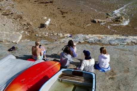 People Sit On Old Stone Quay Editorial Stock Photo - Stock Image ...