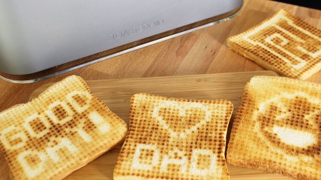 Some Designs On Toast Created Using Editorial Stock Photo - Stock Image ...