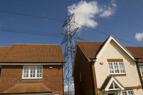 Electricity Pylon Towering Over Newly Built Editorial Stock Photo - Stock Image | Shutterstock
