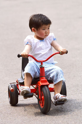 Model Released Girl On Tricycle Editorial Stock Photo - Stock Image ...
