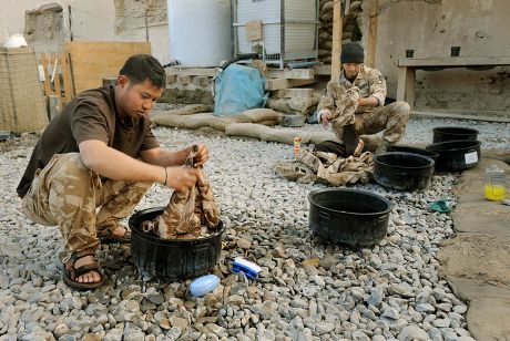13 Soldier washing clothes Stock Pictures, Editorial Images and Stock ...