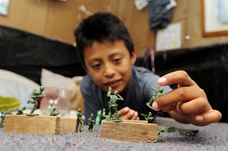 89 Soldiers play with children Stock Pictures, Editorial Images and ...